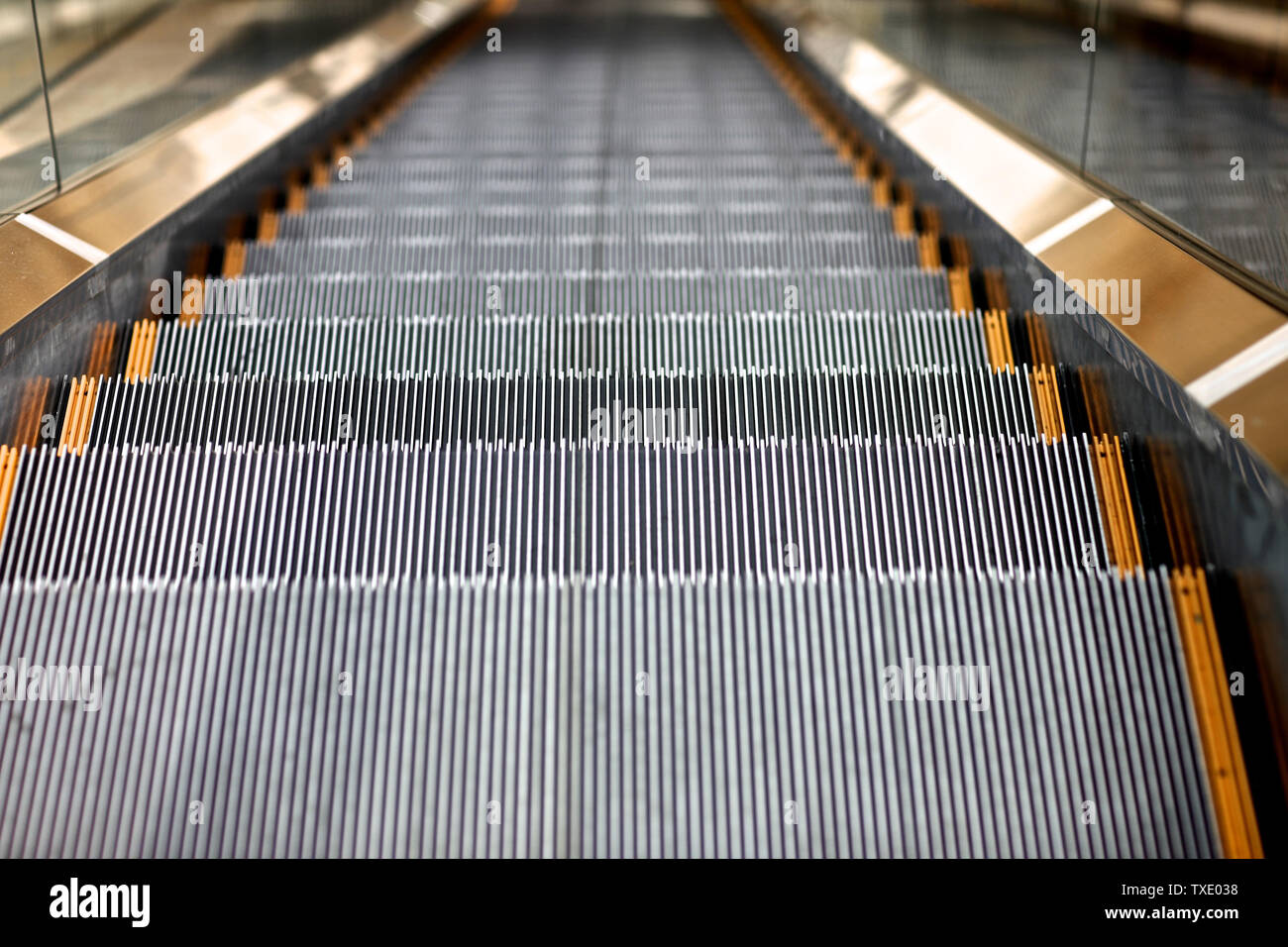 Steps of escalator in business center Stock Photo - Alamy