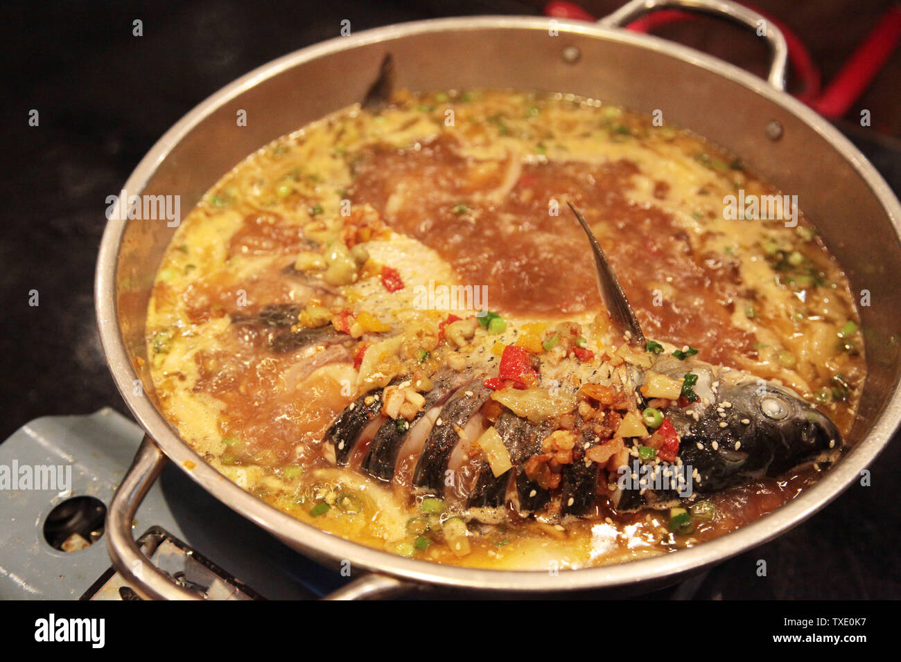 Diving fish, braised fish Stock Photo - Alamy