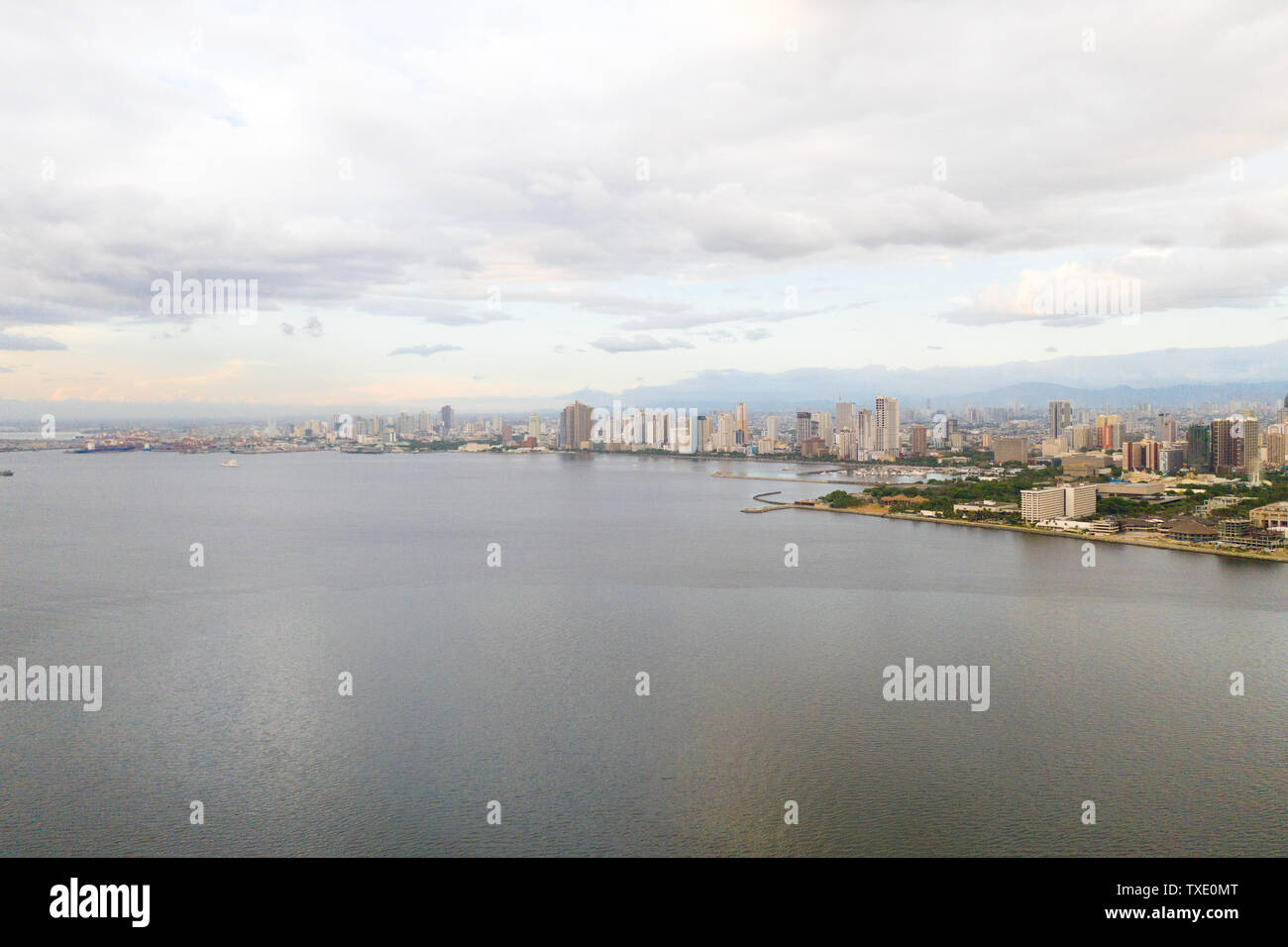 Manila city in the morning, view from above. Panorama of a large port ...