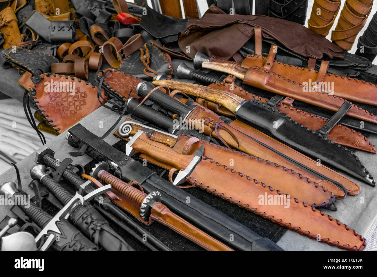 some daggers and other equipment seen at a medieval market Stock Photo ...