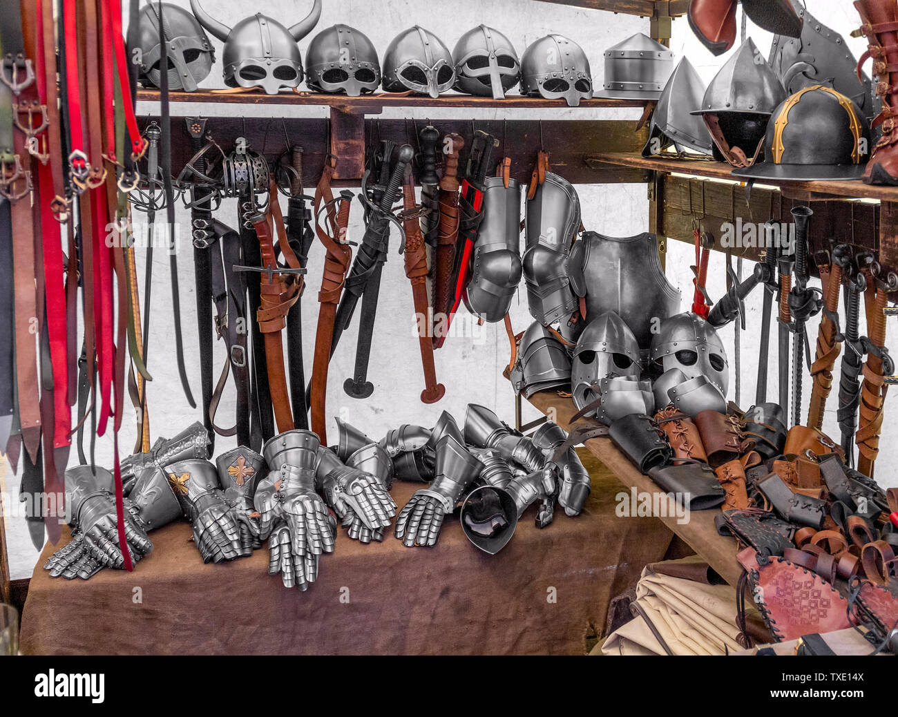 some weapons and other equipment seen at a medieval market Stock Photo ...