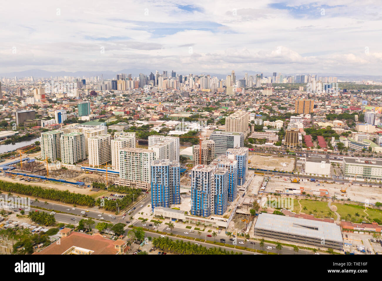 Construction of high modern houses in Manila. The city of Manila, the ...