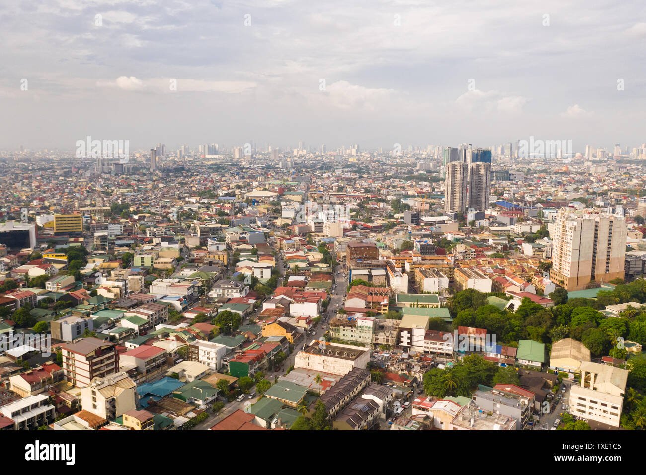 Residential areas and streets of Manila, Philippines, top view. Roofs ...