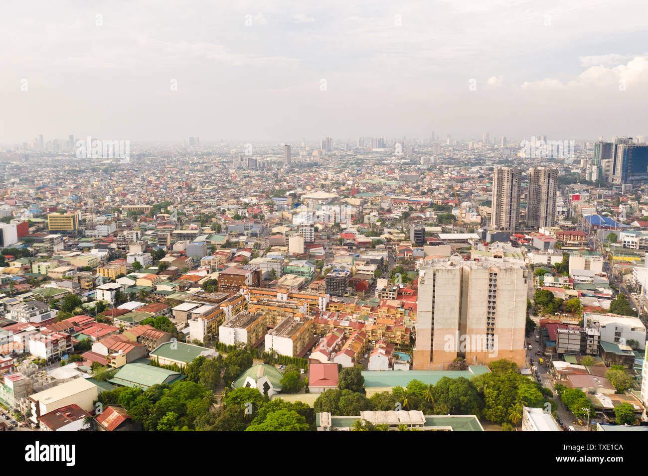 Residential areas and streets of Manila, Philippines, top view. Roofs ...