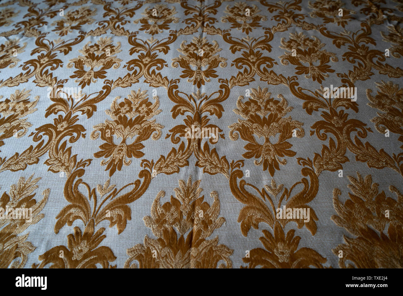 medieval fabric close up detail texture background gold and white Stock ...