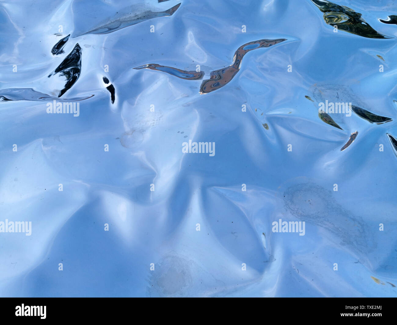 Metallic liquid reflection background texture Stock Photo - Alamy