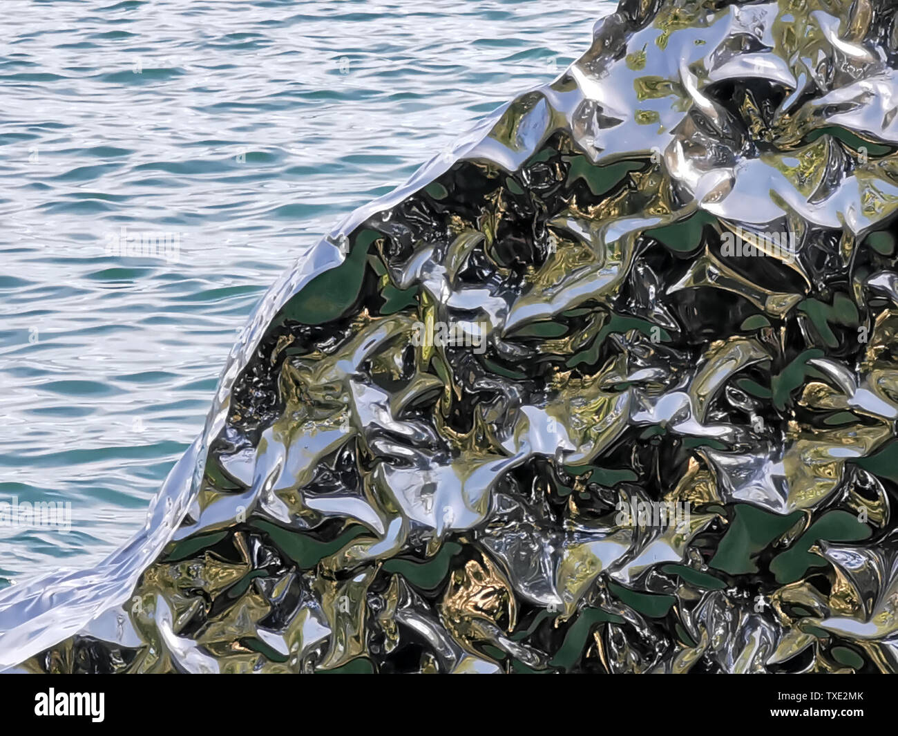 Metallic iceberg liquid reflection background texture Stock Photo - Alamy