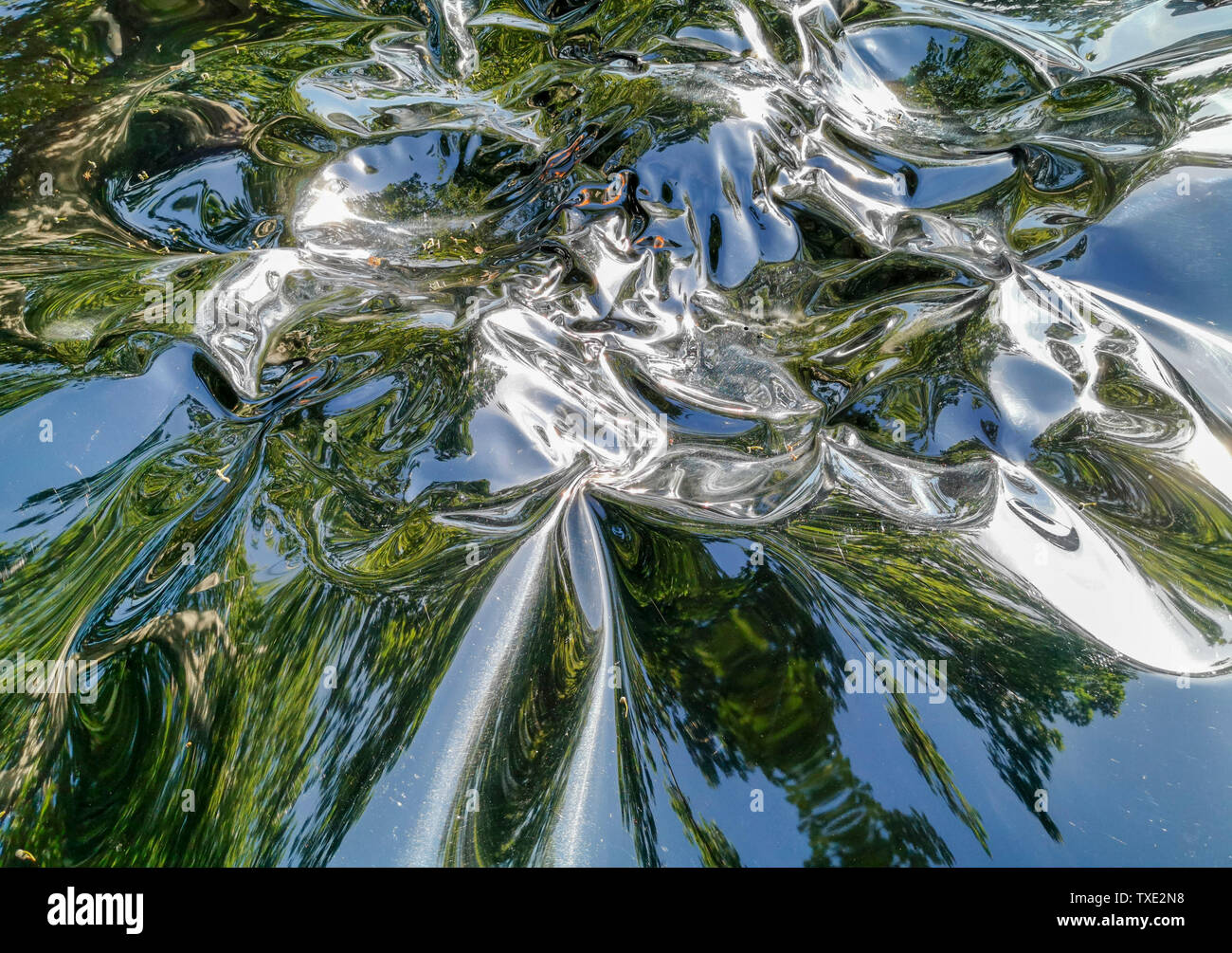 Metallic liquid reflection background texture Stock Photo - Alamy