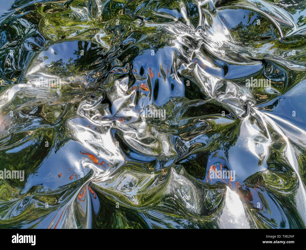 Metallic liquid reflection background texture Stock Photo - Alamy