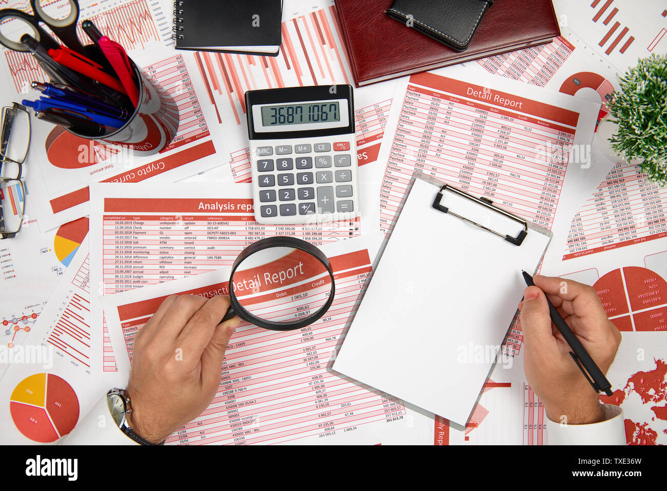 Business reports, blank paper sheet, data tables and charts - directly ...