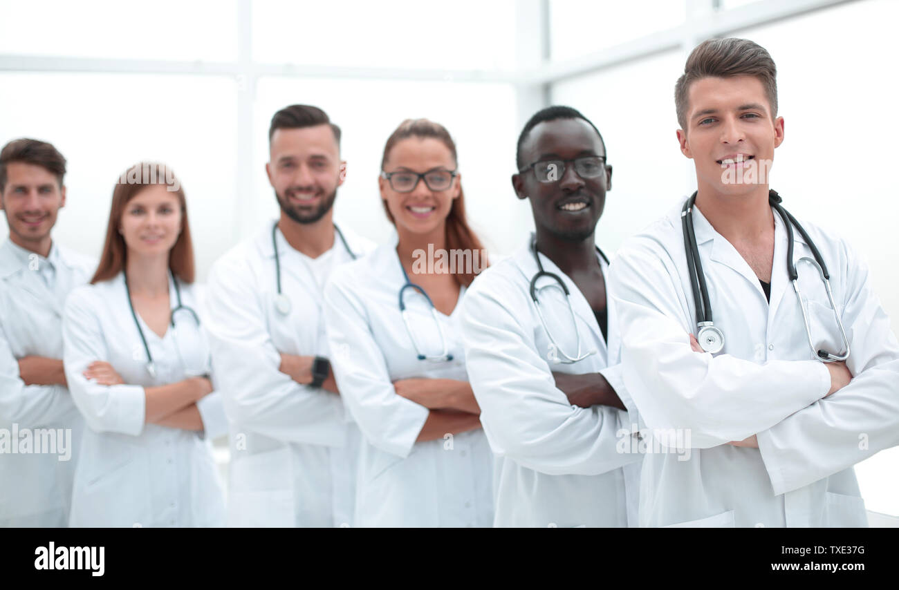 Young doctors looking at camera Stock Photo - Alamy