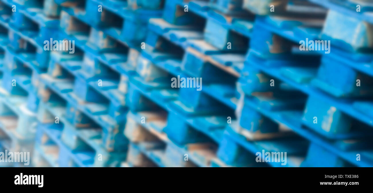 abstract blur of blue wooden pallets for transportation. background ...