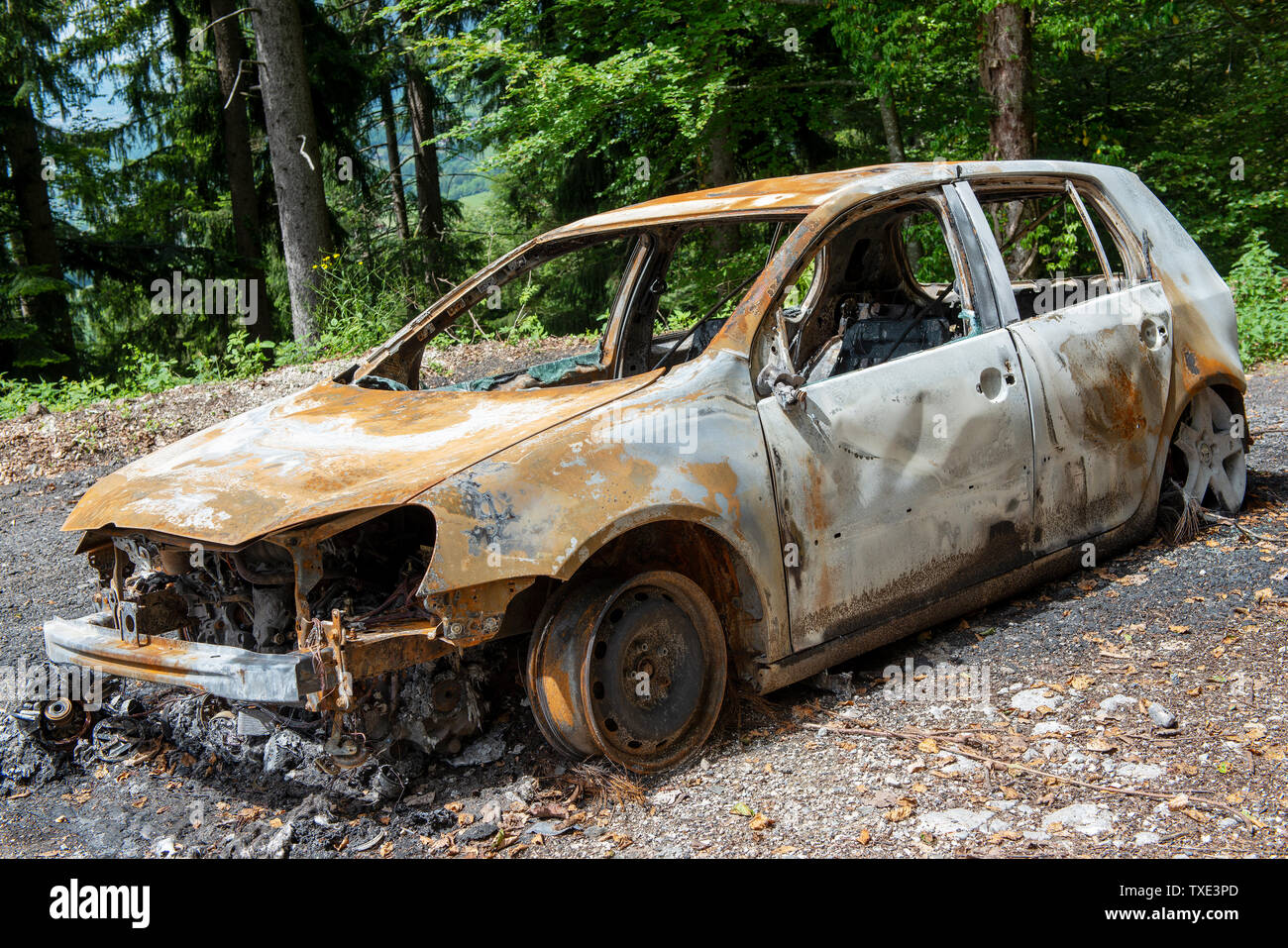 a carbonized car. Completely burnt out and carbonised car Stock Photo ...