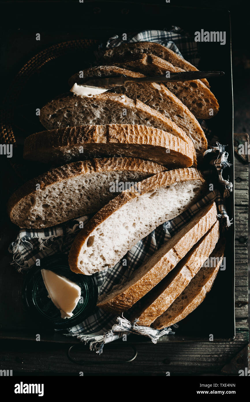 Sourdough bread. Brown bread. Dark background Stock Photo - Alamy
