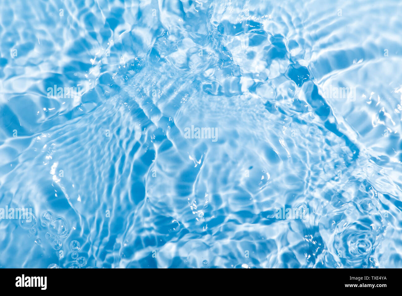 Crystal clear water ripples Stock Photo - Alamy
