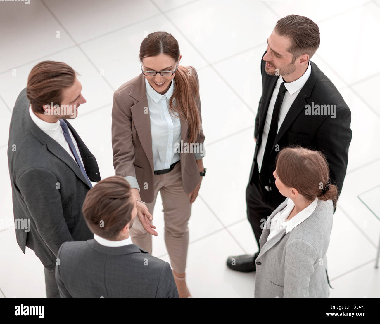 group of business people standing in the office reception Stock Photo ...