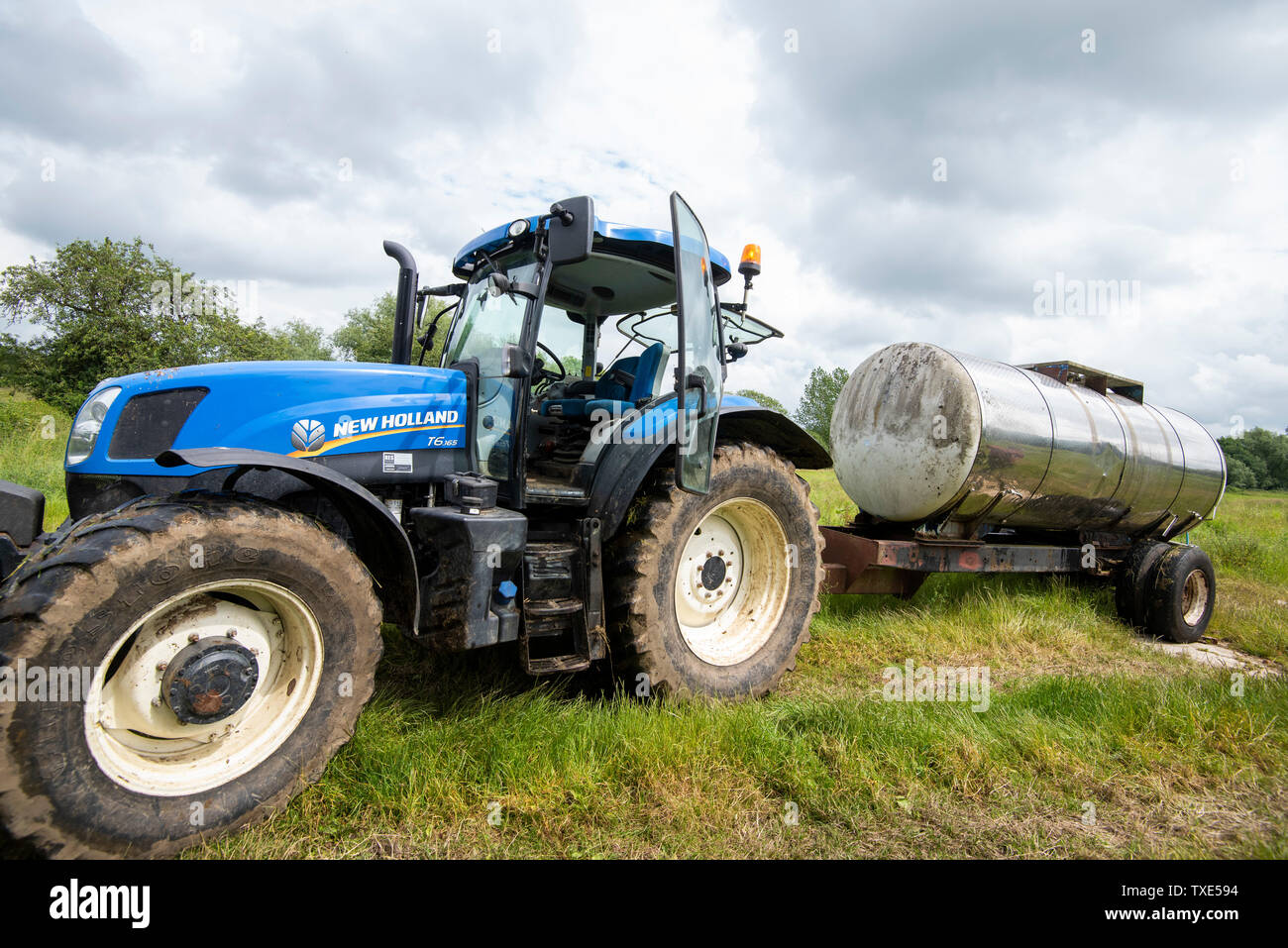 Tractor and Water Tank on a Dairy Farm in Rural Leicestershire, England ...