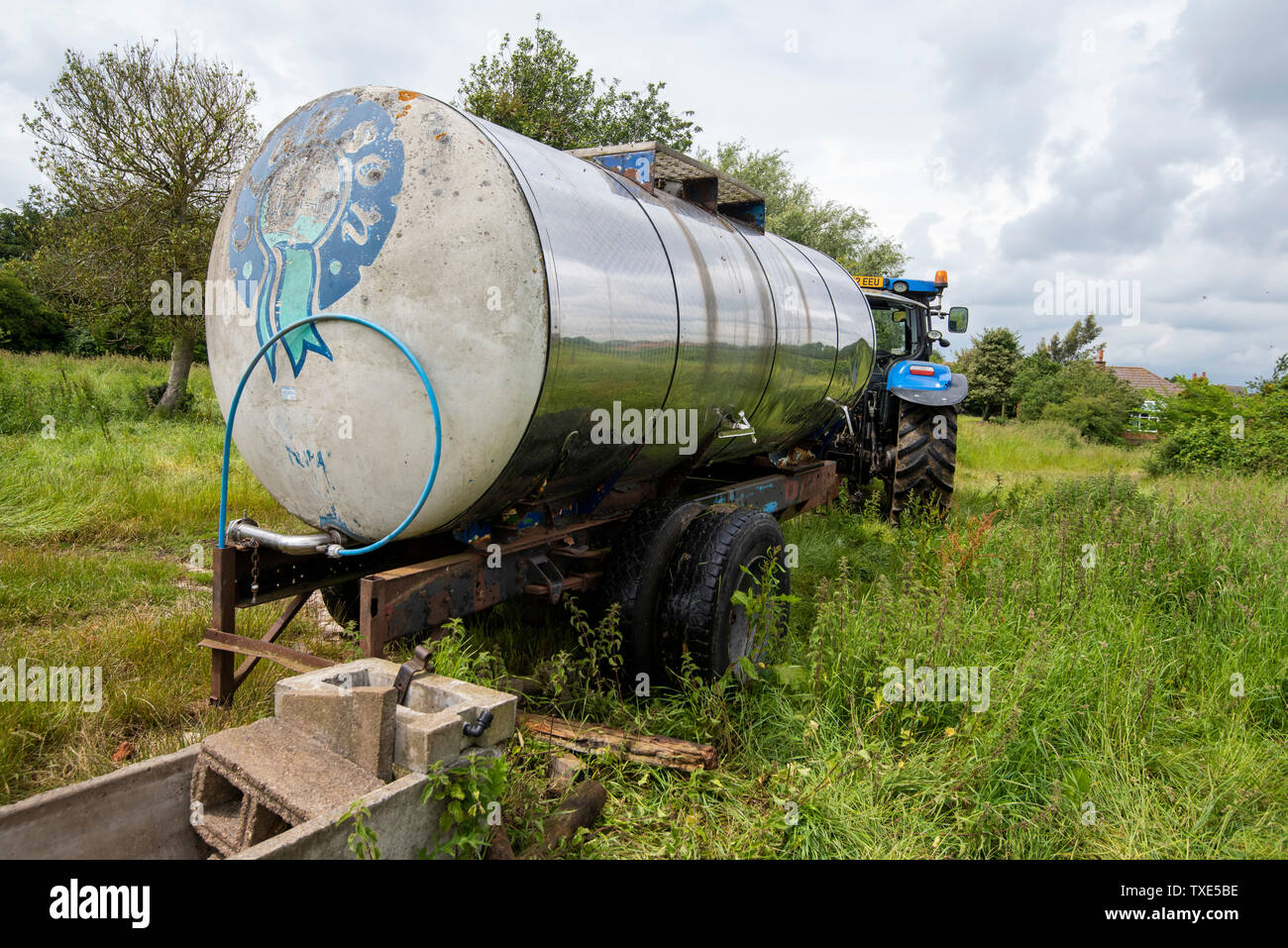 Tractor and Water Tank on a Dairy Farm in Rural Leicestershire, England ...