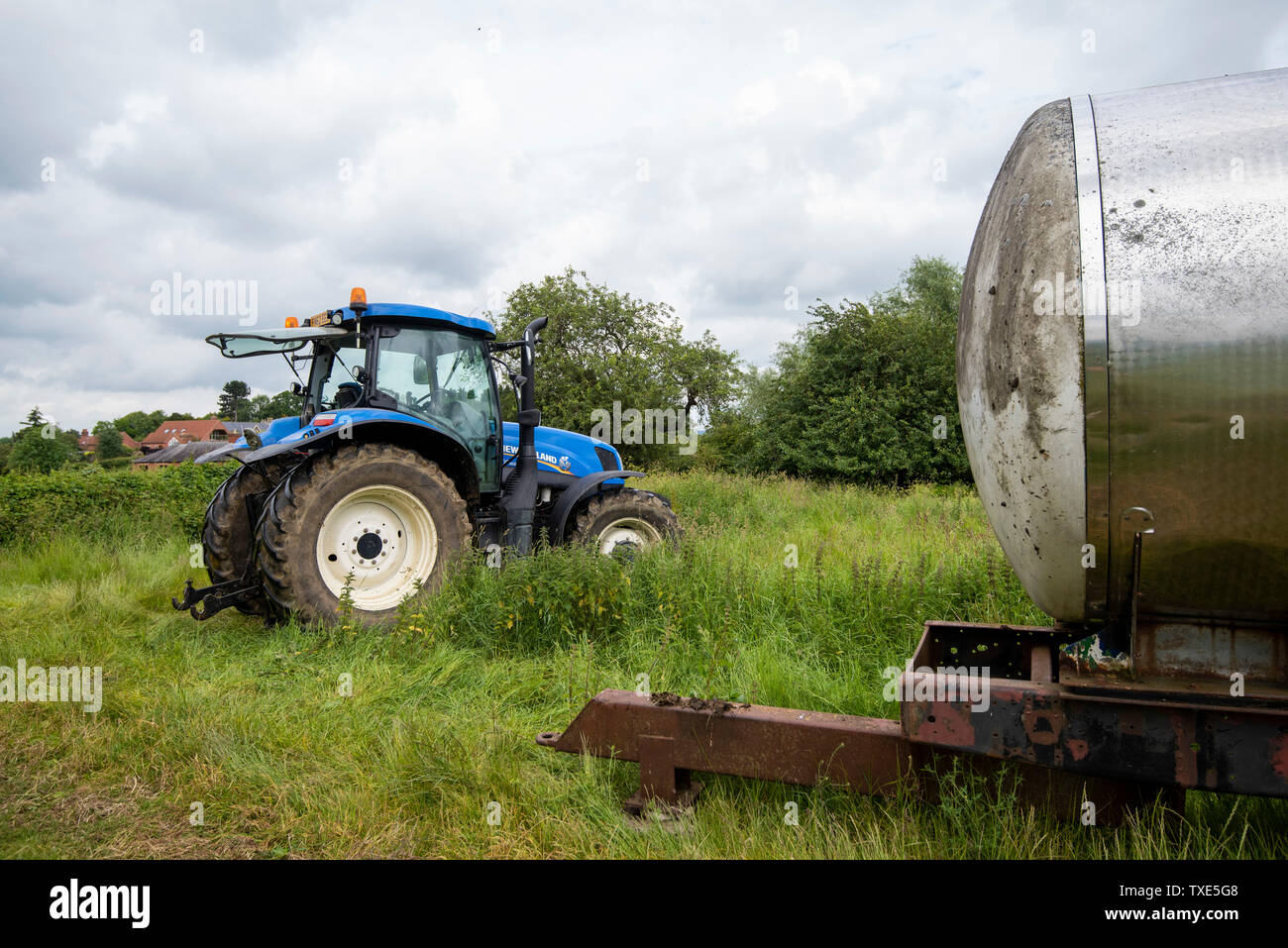 Tractor and Water Tank on a Dairy Farm in Rural Leicestershire, England ...