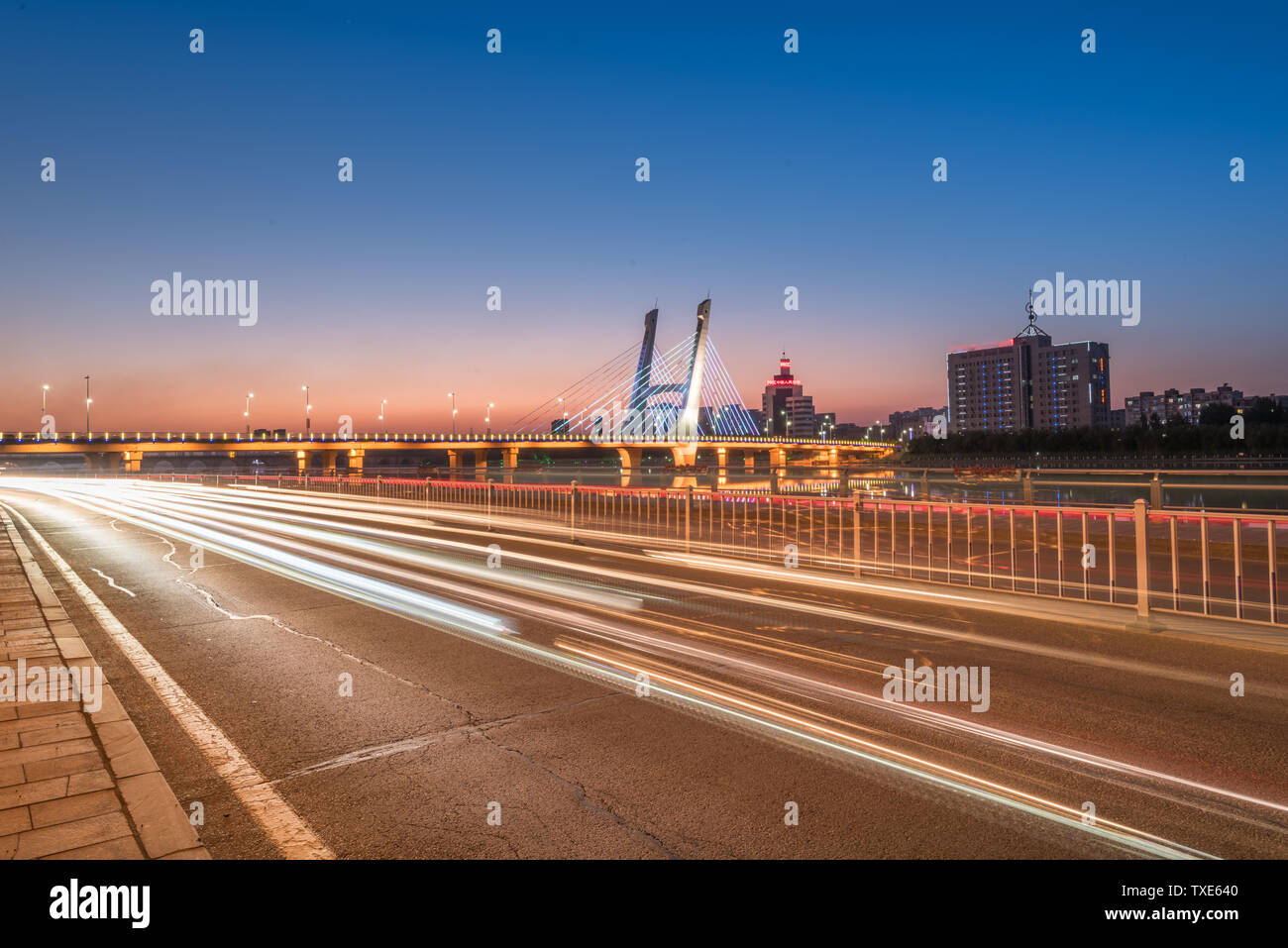 Lighting night view of cross-river bridge in Fushun city, China in ...