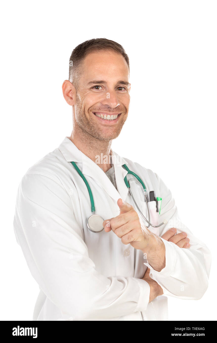Young doctor pointing something with his finger isolated on a white ...