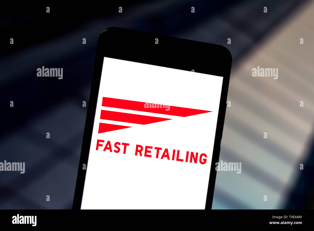 June 1, 2019 - Brazil - In this photo illustration a Fast Retailing ...