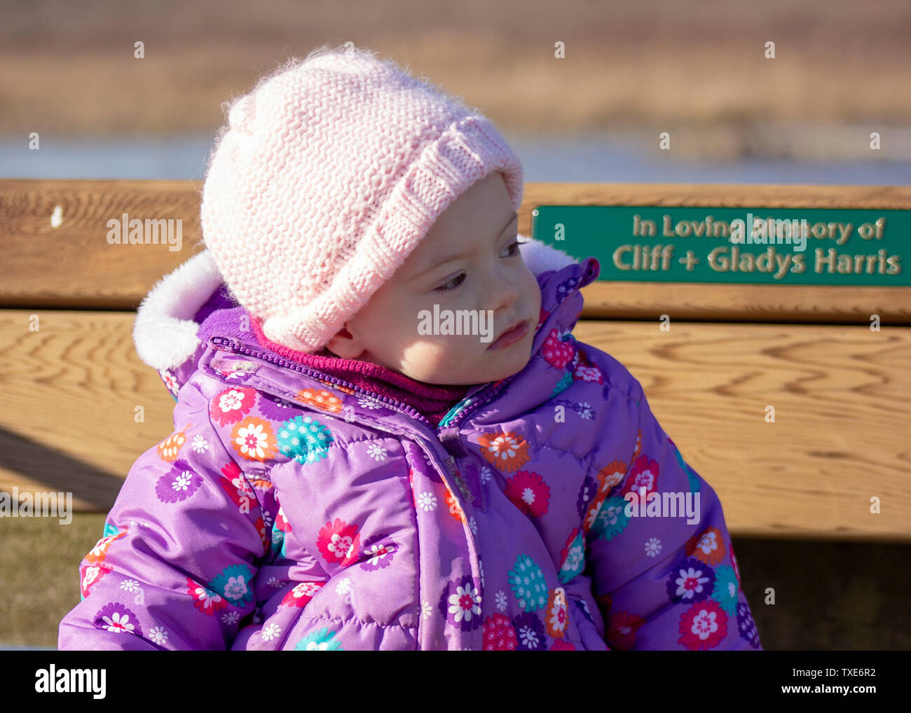 20 months old baby enjoying the nice weather outside. Toddler girl ...
