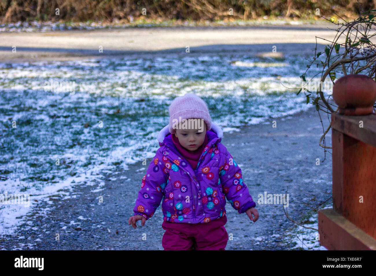 20 months old baby enjoying the nice weather outside. Toddler girl ...