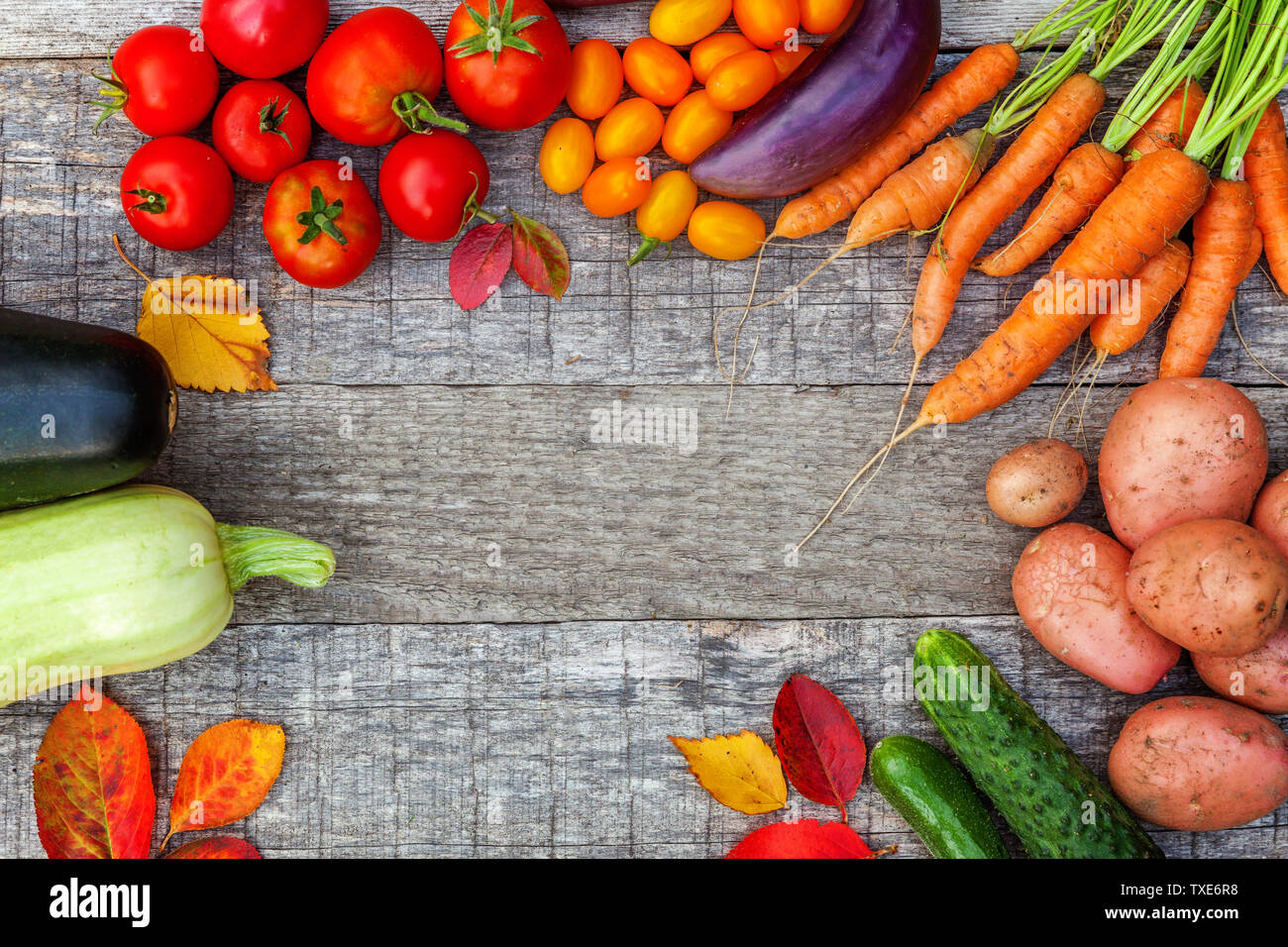 Assortment different fresh organic vegetables on country style wooden ...