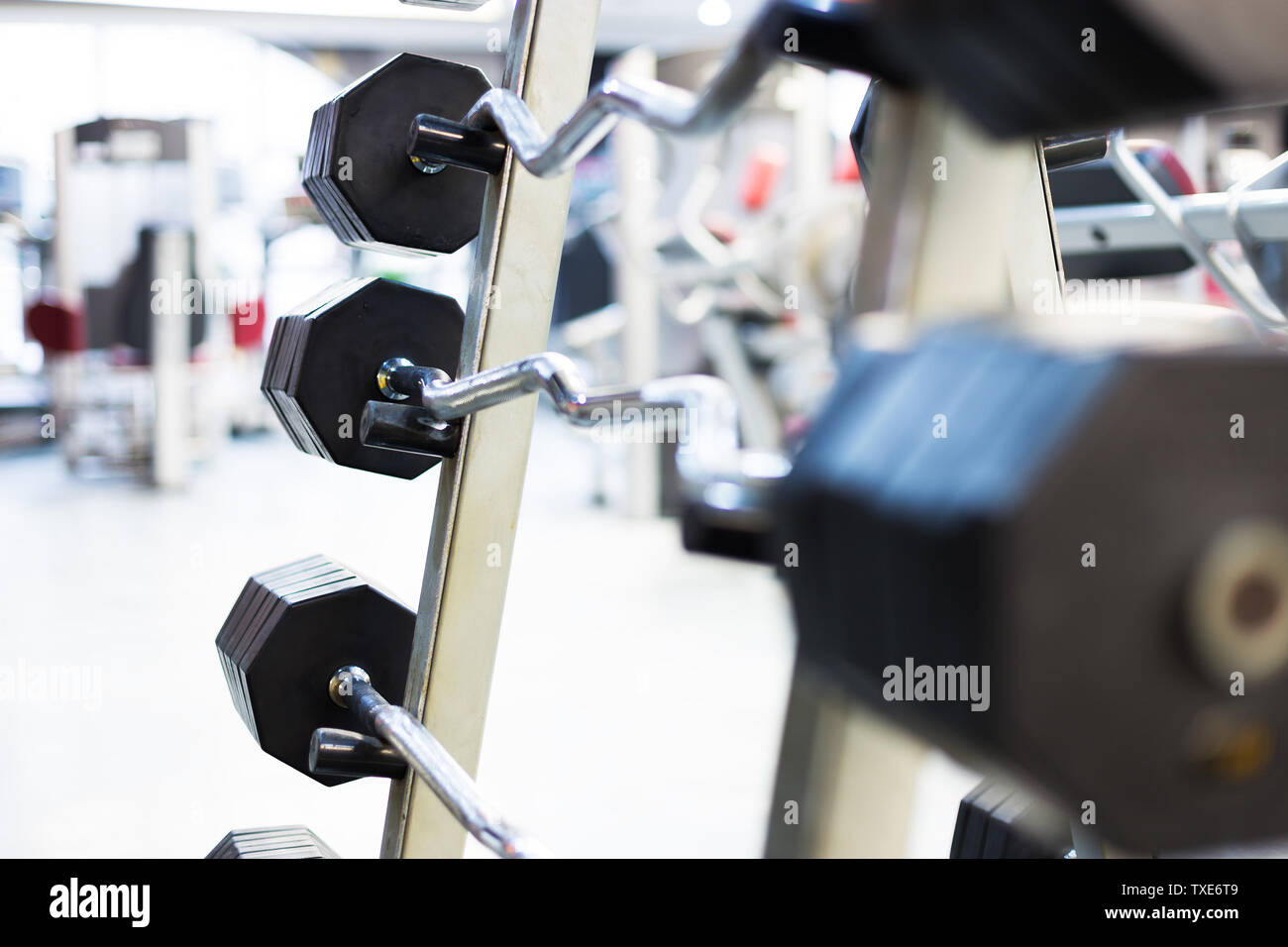 equipment for power exercise in modern gym Stock Photo - Alamy