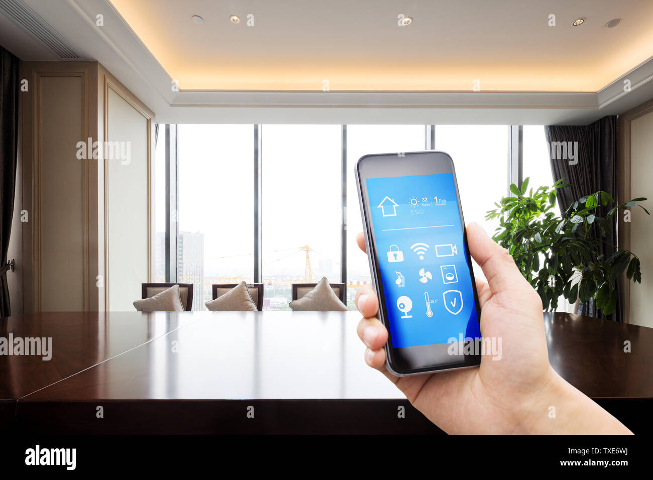 mobile phone in smart home with painted table Stock Photo - Alamy