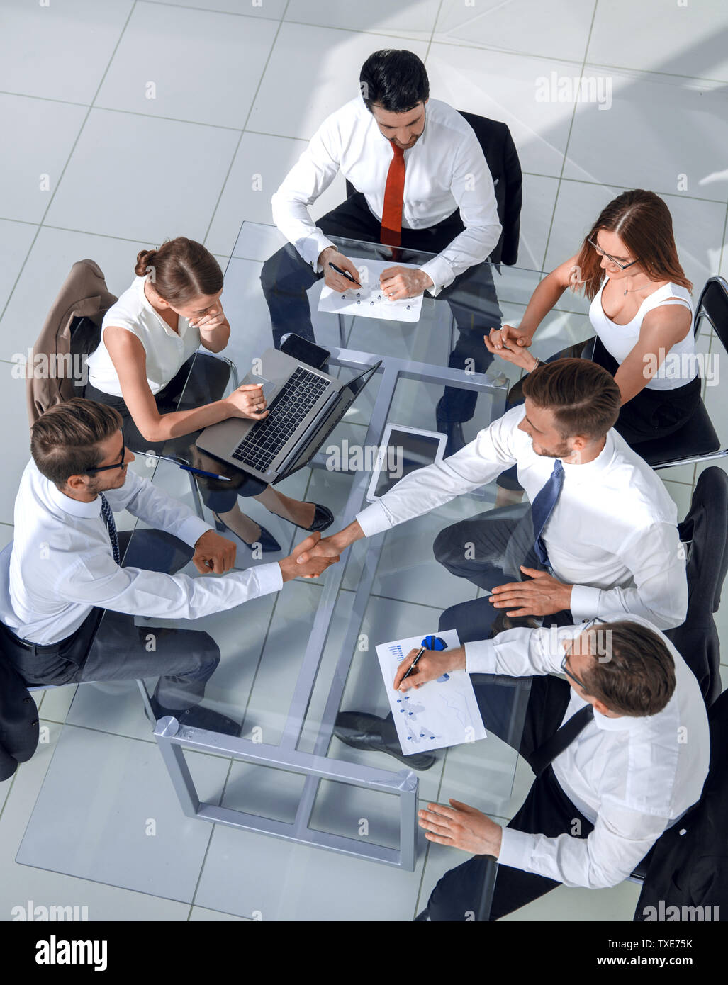 Business team discussing together business plans Stock Photo - Alamy