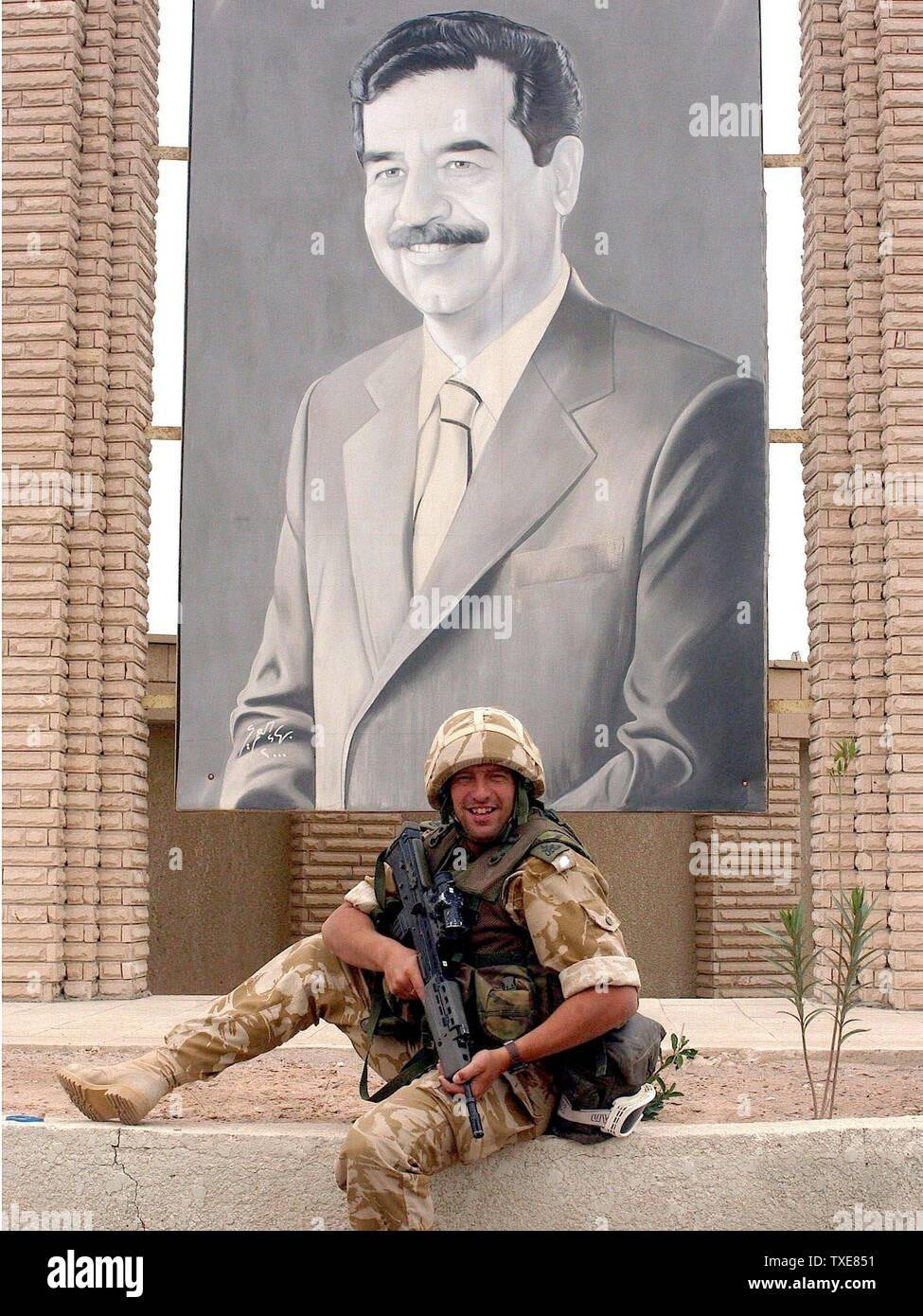 REX2003032707 - Iraq, March (UPI) -- A British soldier poses near a ...