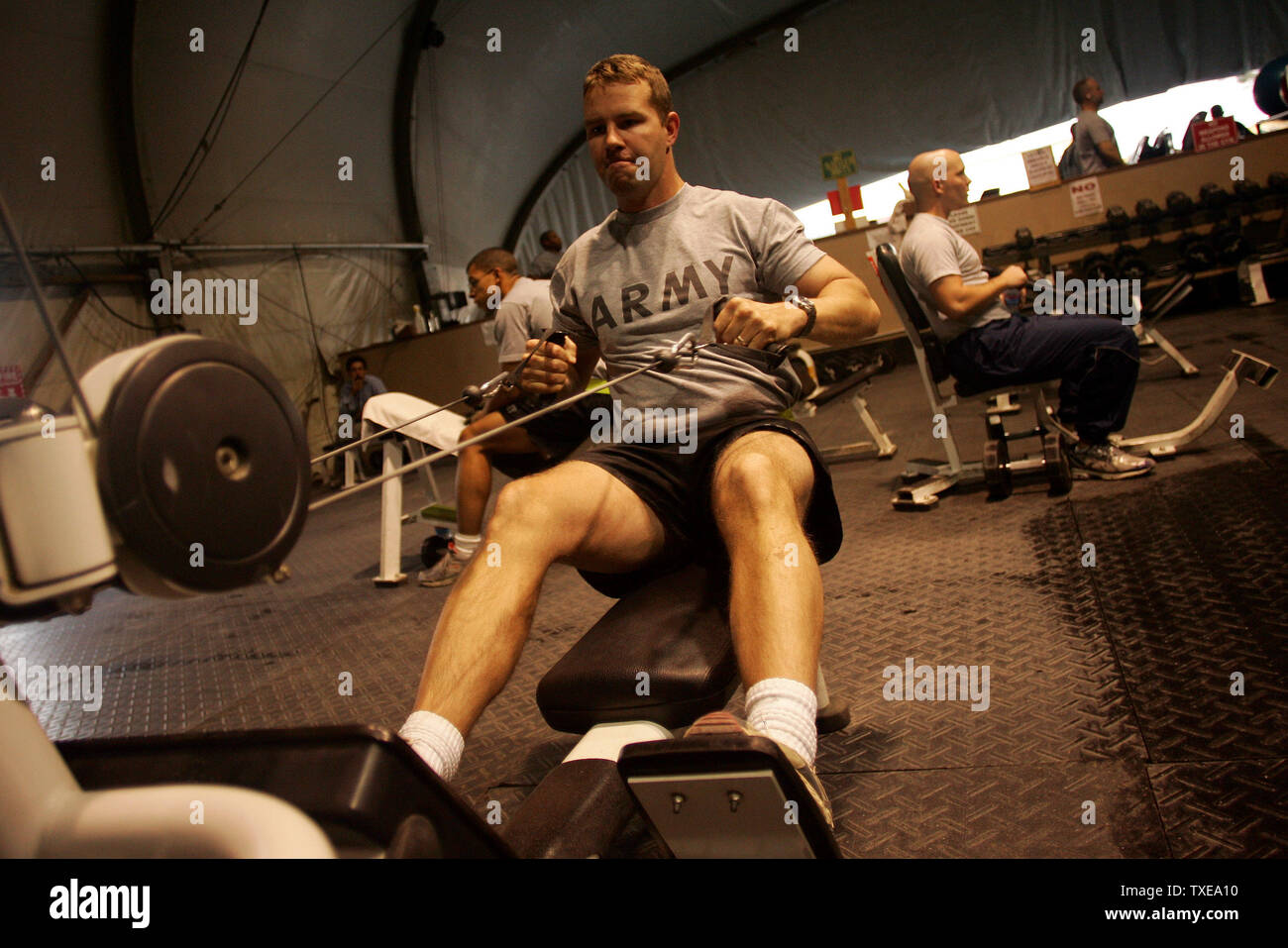 U.S. service members exercise in a gym at the main U.S. base in Bagram ...