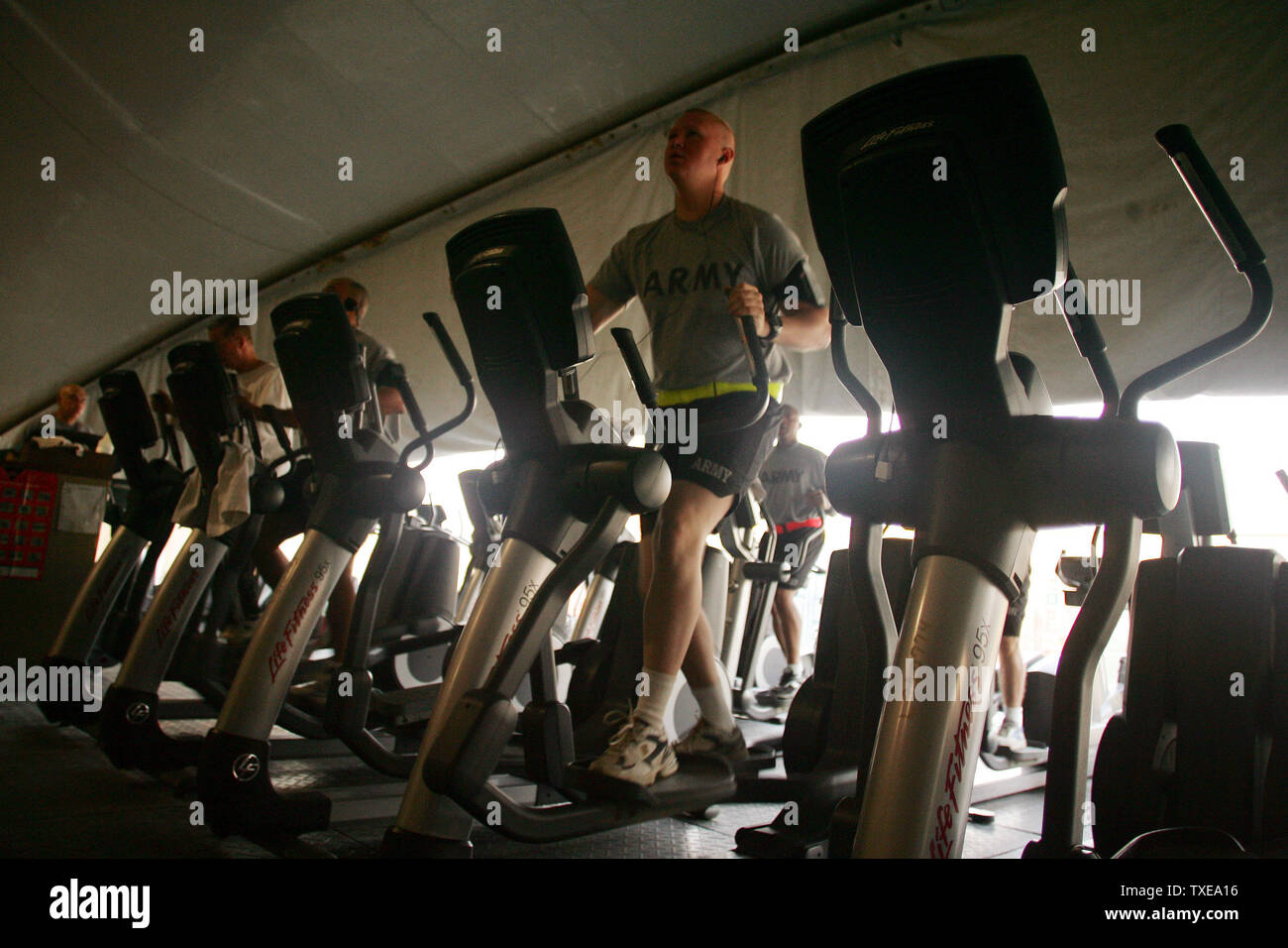 U.S. service members exercise in a gym at the main U.S. base in Bagram ...