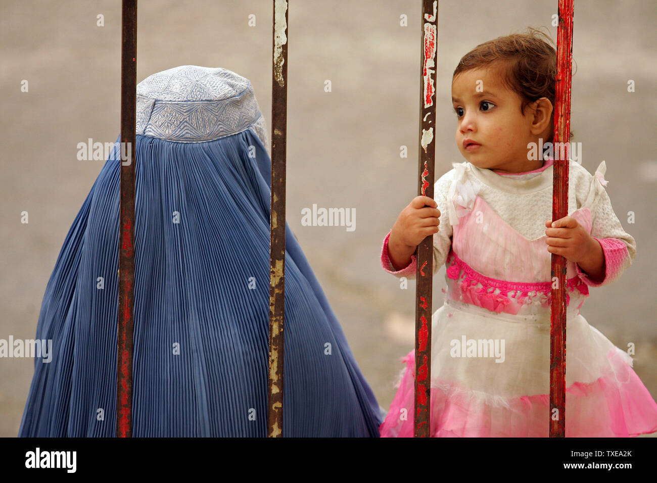 Clad in burqa hi-res stock photography and images - Alamy