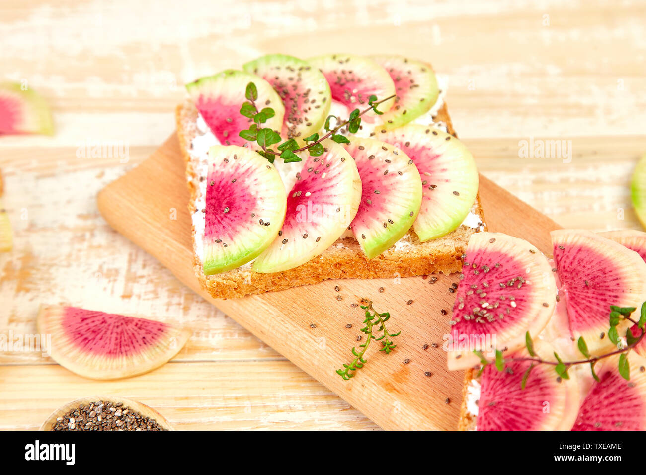 Healthy breakfast toasts from sliced watermelon radish or chinese ...