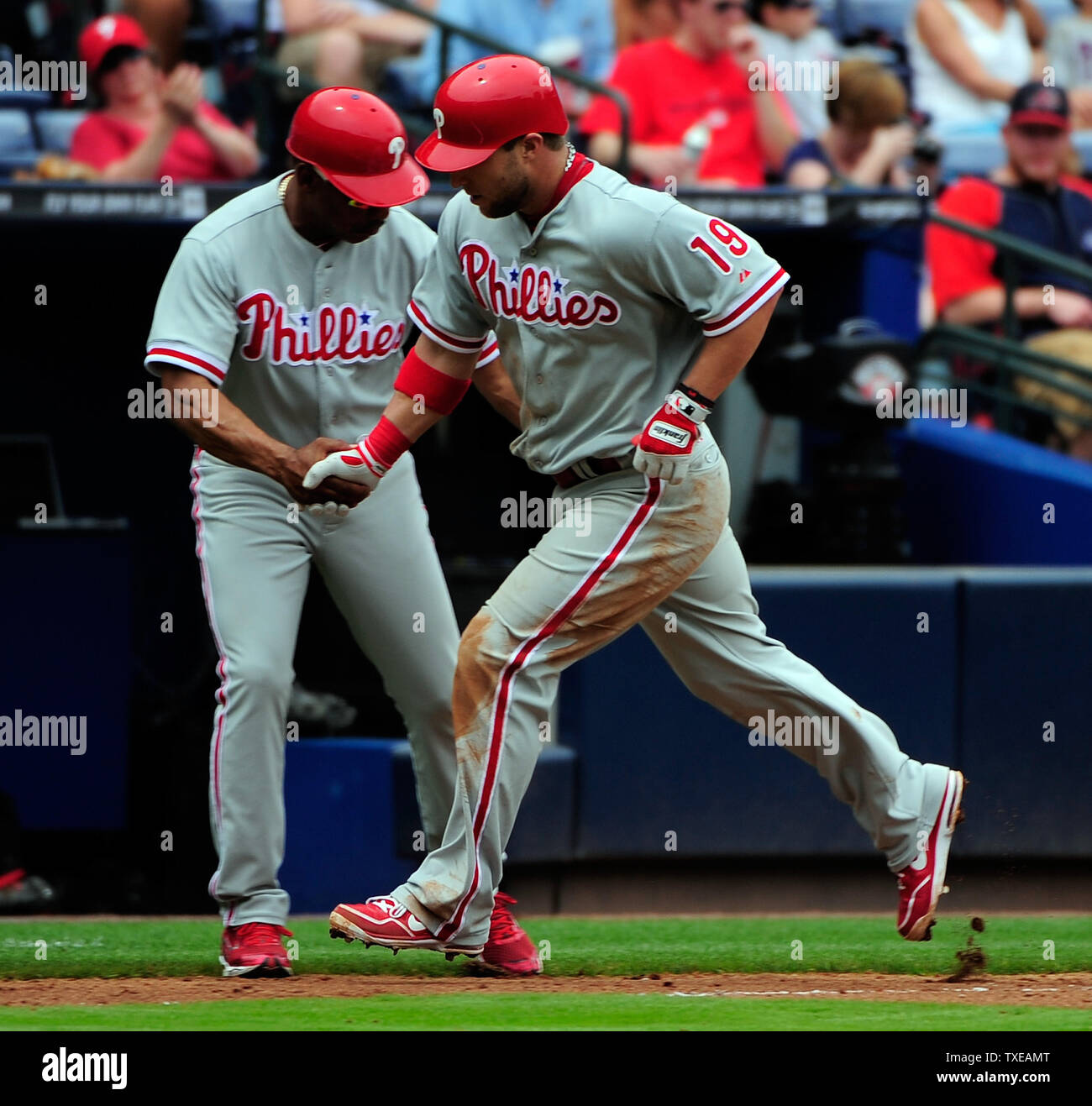 Philadelphia Phillies batter Laynce Nix (19) is congratulated by third ...