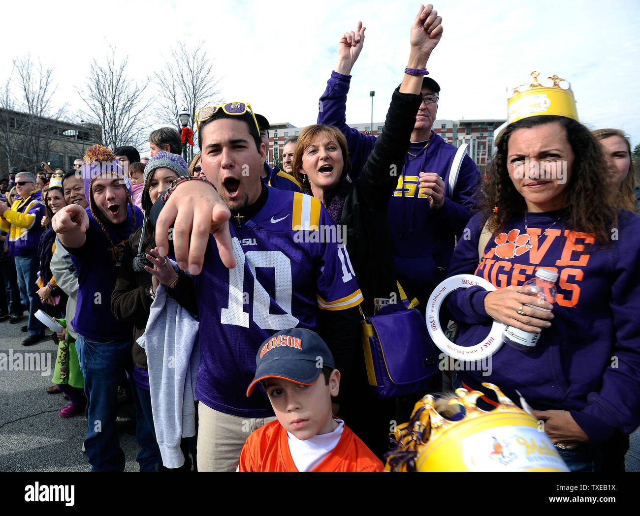 LSU fans cheer along Andrew Young International Boulevard for the ...