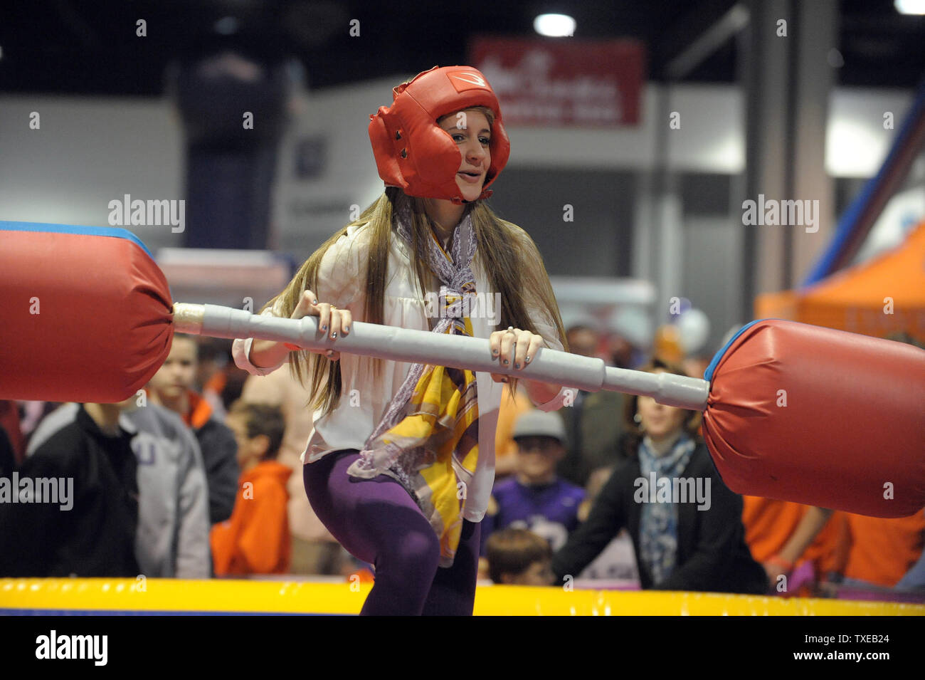 SEC and ACC fans participate in the Chick-fil-A Bowl Fan Fest at the ...