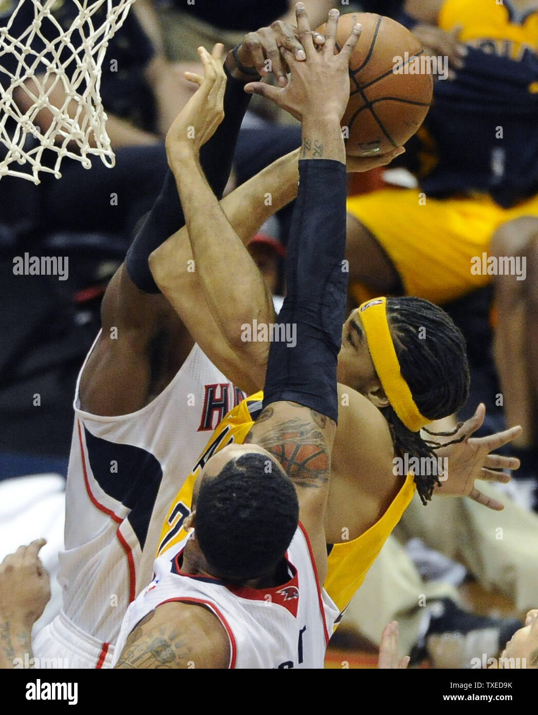 Indiana Pacers' Chris Copeland (R) is fouled by Atlanta Hawks' Paul ...
