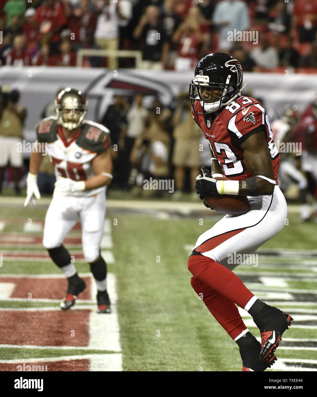 Atlanta Falcons wide receiver Harry Douglas (83) scores on a 3-yard ...