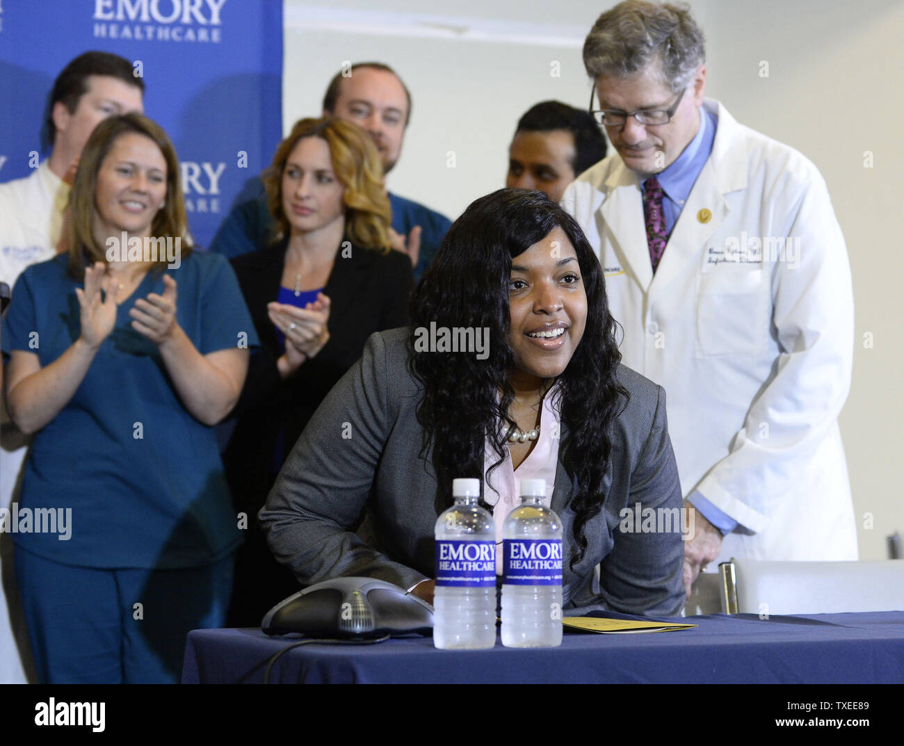 Amber Vinson (C), one of two nurses from Dallas who contracted the ...