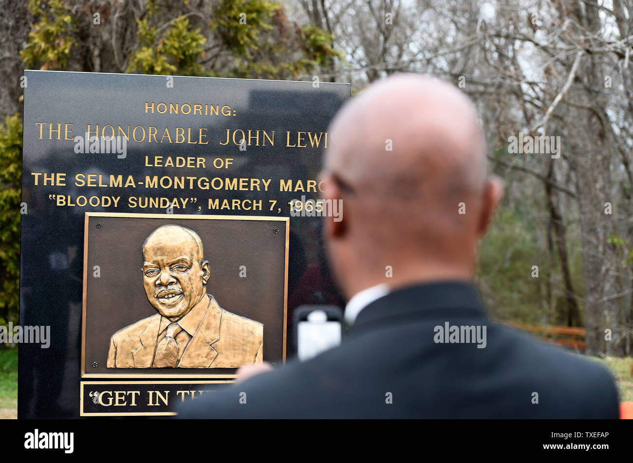 People view a historic plaque of Rep. John Lewis, who was injured in ...