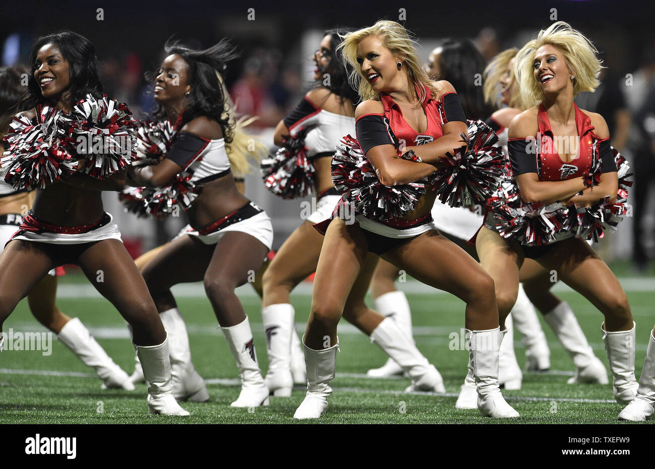 Atlanta Falcons cheerleaders perform during the second half of a season ...