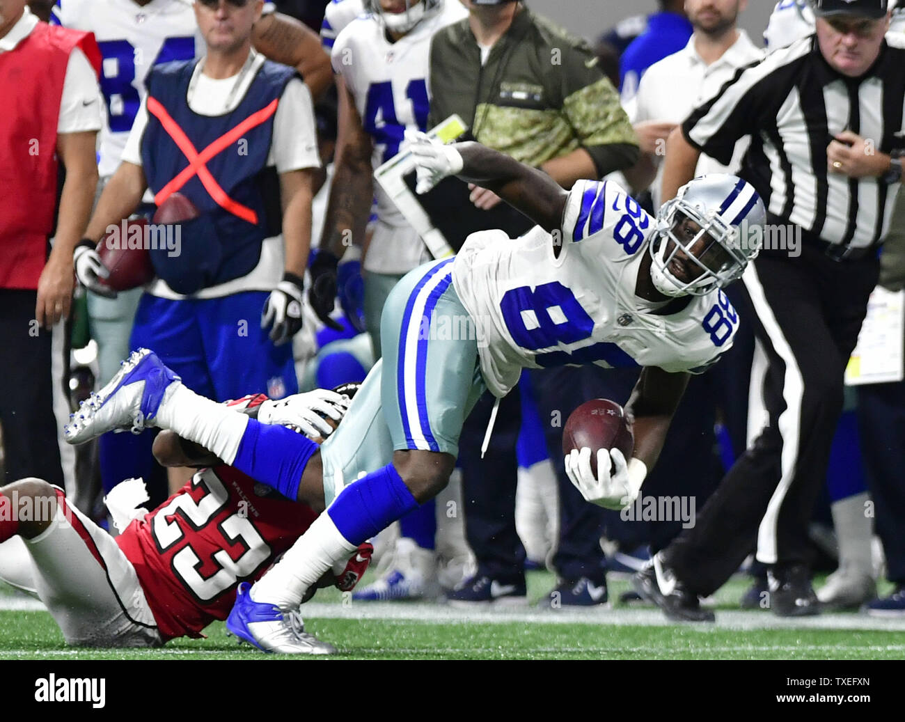 Dallas Cowboys wide receiver Dez Bryant (88) charges over Atlanta ...