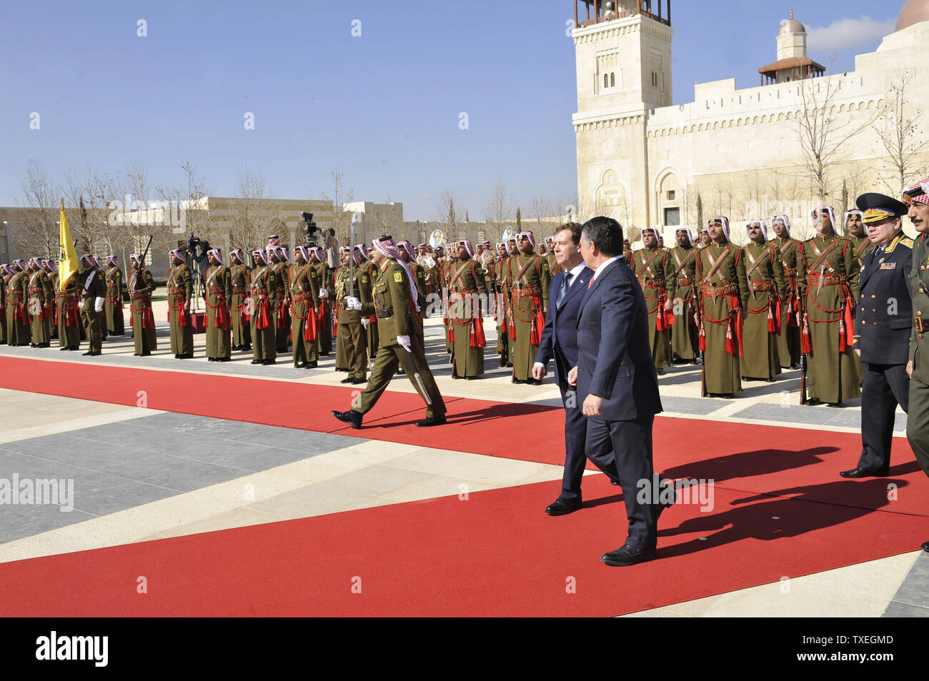 Jordan's King Abdullah walks with Russian President Dmitry Medvedev ...