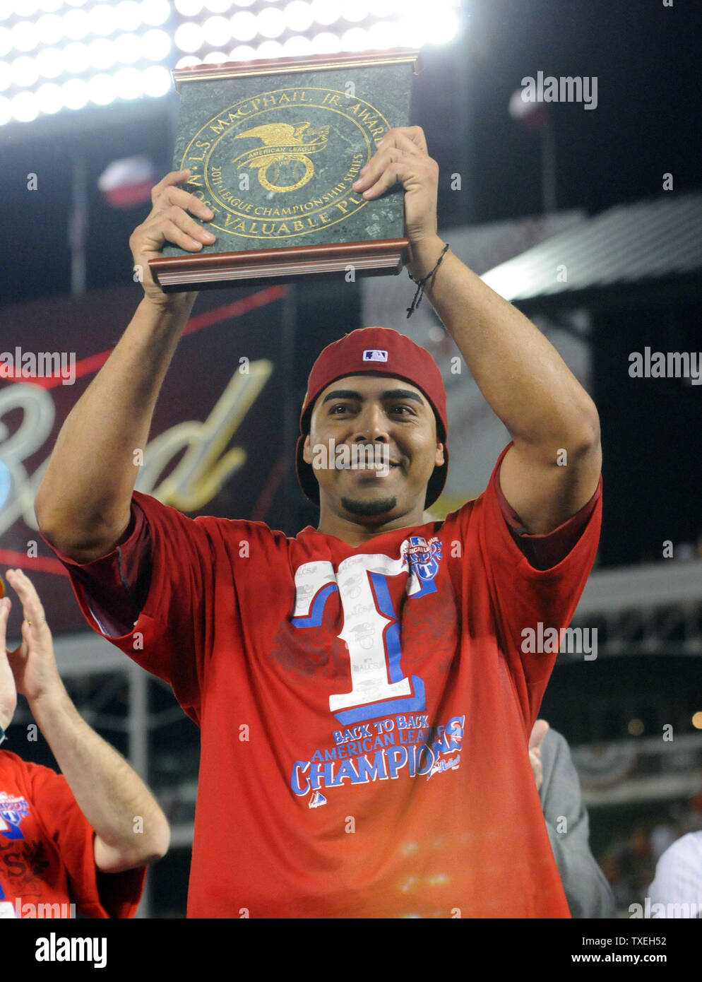 Texas Rangers Nelson Cruz holds up the ALCS Most Valuable Player Award ...