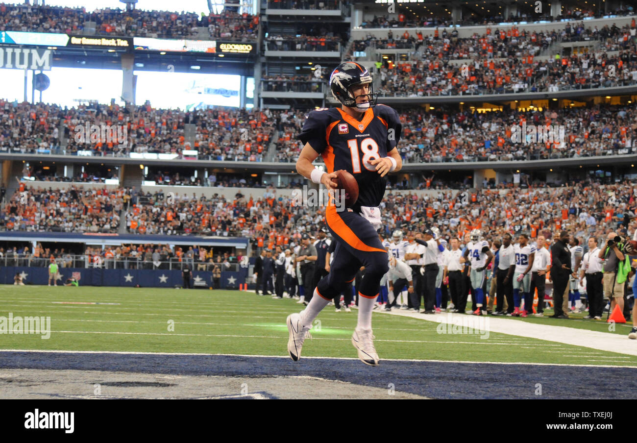 Denver Broncos quarterback Payton Manning scores a second quarter ...