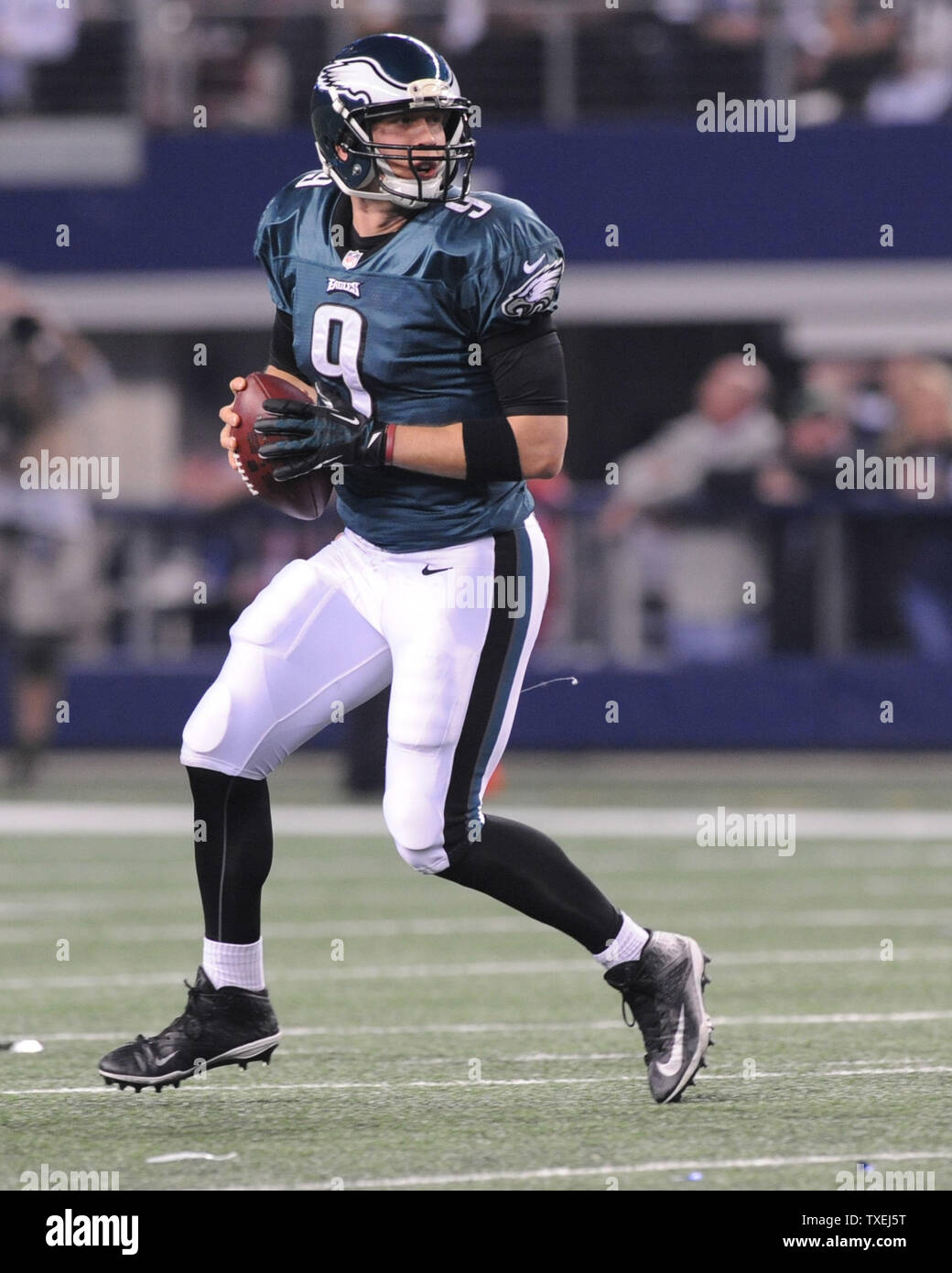 Philadelphia Eagles Nick Foles rolls out of the pocket against the ...